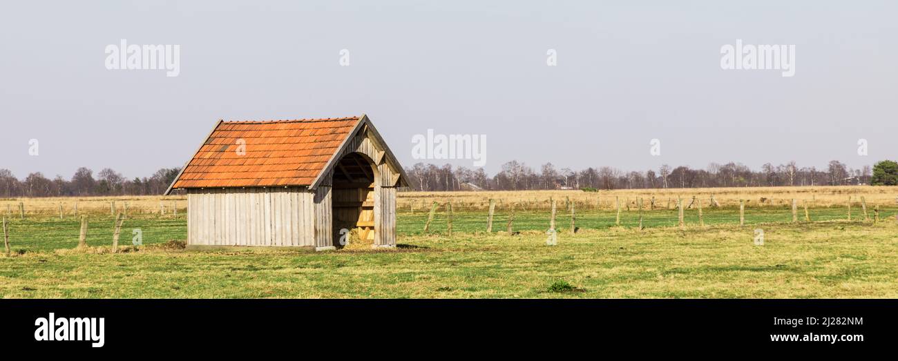 A panoramic view of an old shed in a middle of a field in Recker Moor ...