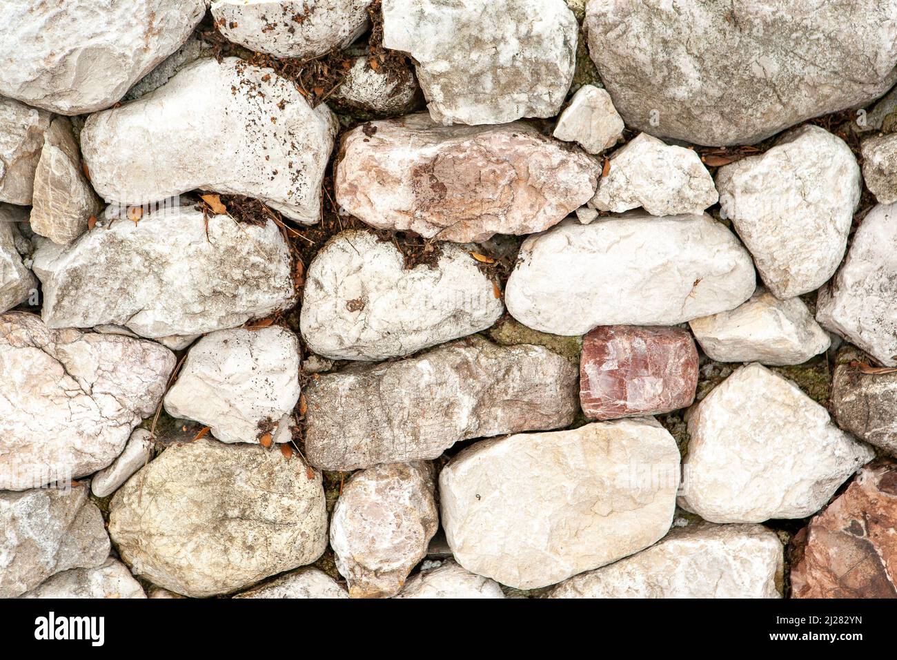Stone wall from big stones for background design. A backing with ...
