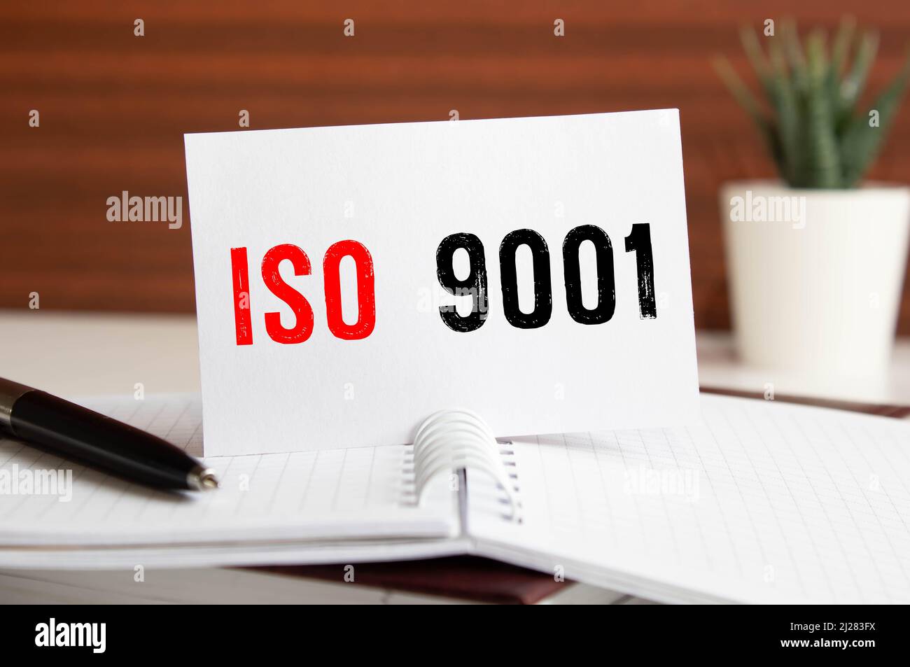 Iso 9001 text concept isolated over white background Stock Photo - Alamy