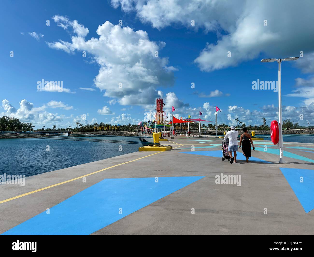 Bahamas - September 16, 2021: People walking on the dock to the ...