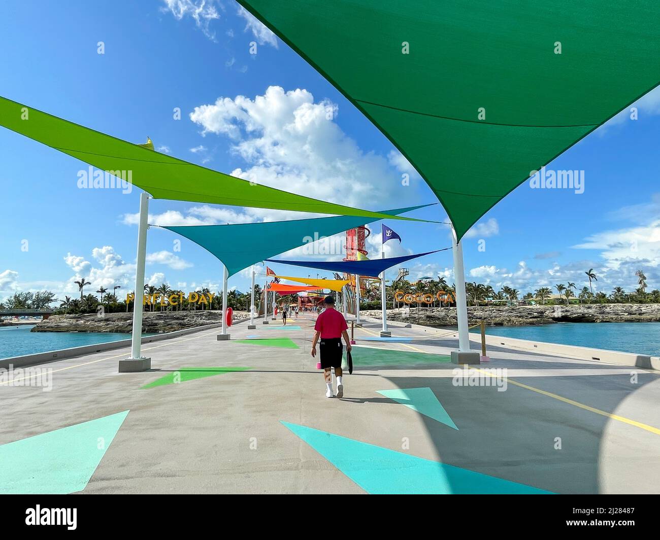 Bahamas - September 16, 2021: People walking on the dock to the ...