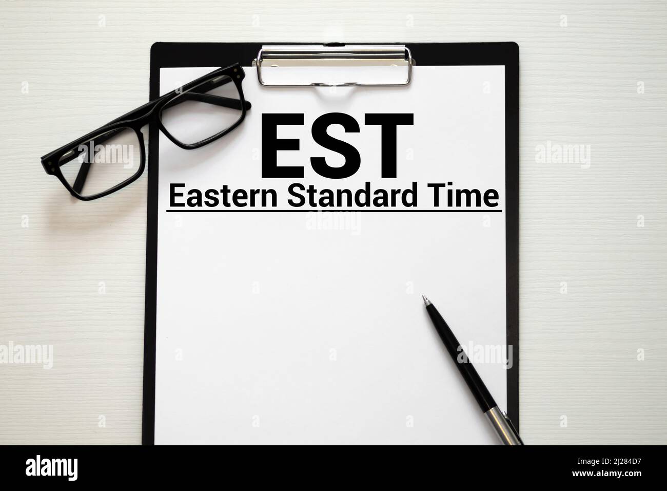 Black color pegboard with white letter in word est Stock Photo - Alamy