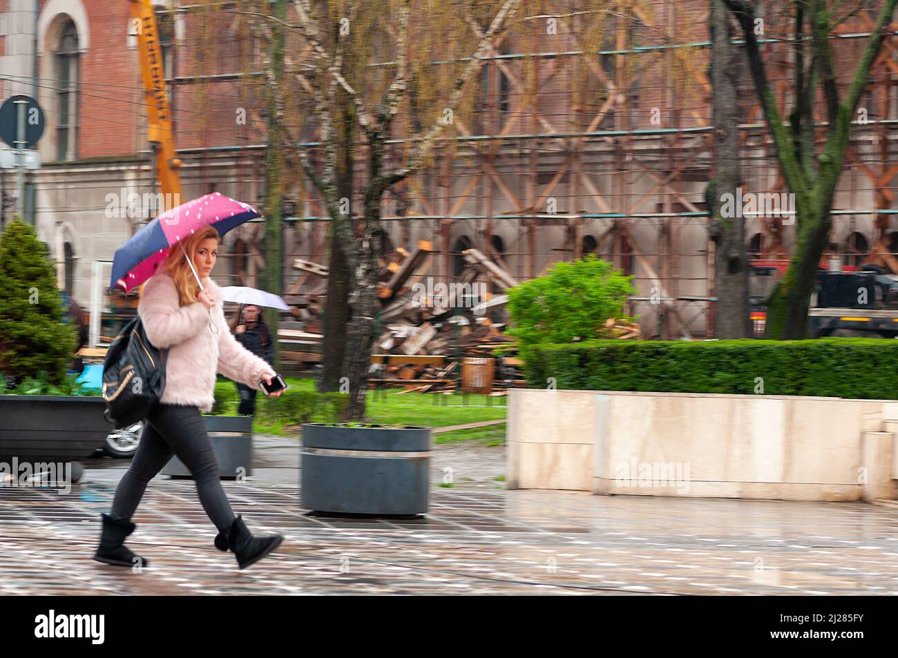Timisoara, Romania - March 23, 2016: Woman walking on the street in the ...