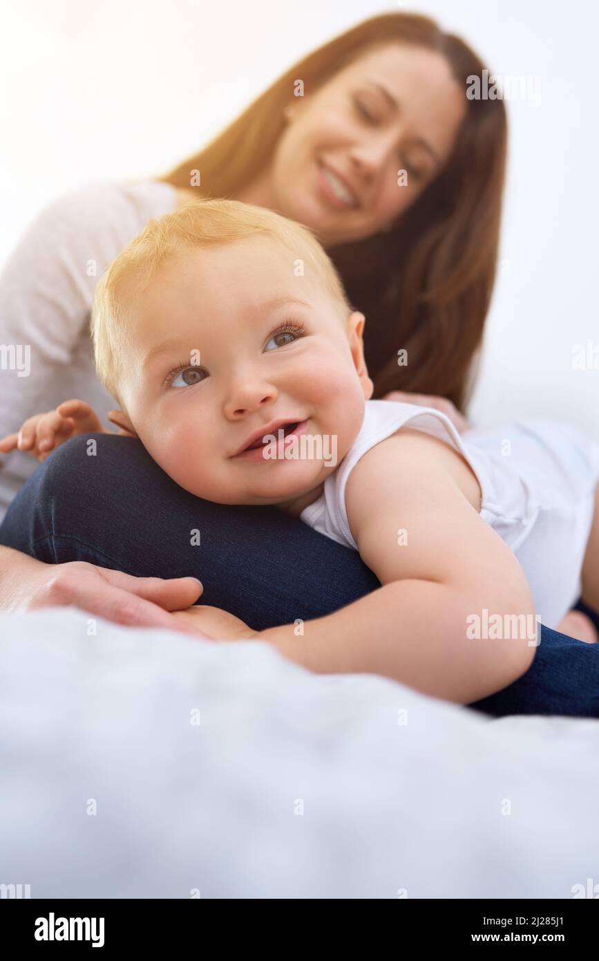 Just chillin with mum. Shot of a mother spending time with her baby boy ...
