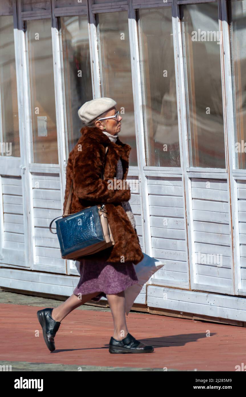 Timisoara, Romania - March 15, 2018: Woman walking on the street. Real ...