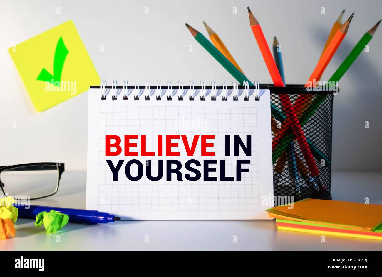 text Believe In Yourself written in notebook Stock Photo - Alamy