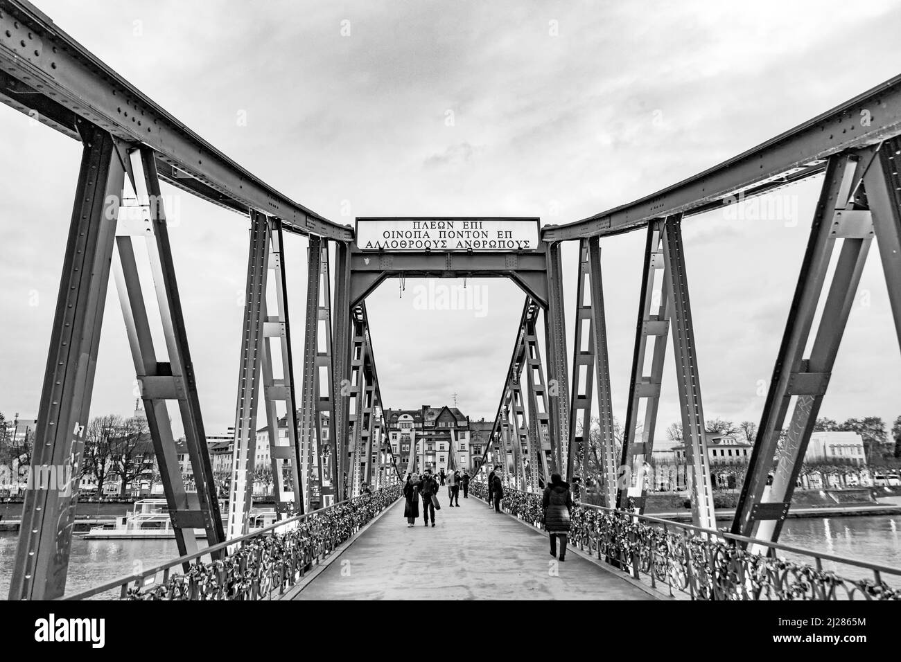 Frankfurt, Germany - January 9, 2019: pedestrian bridge crossing river ...