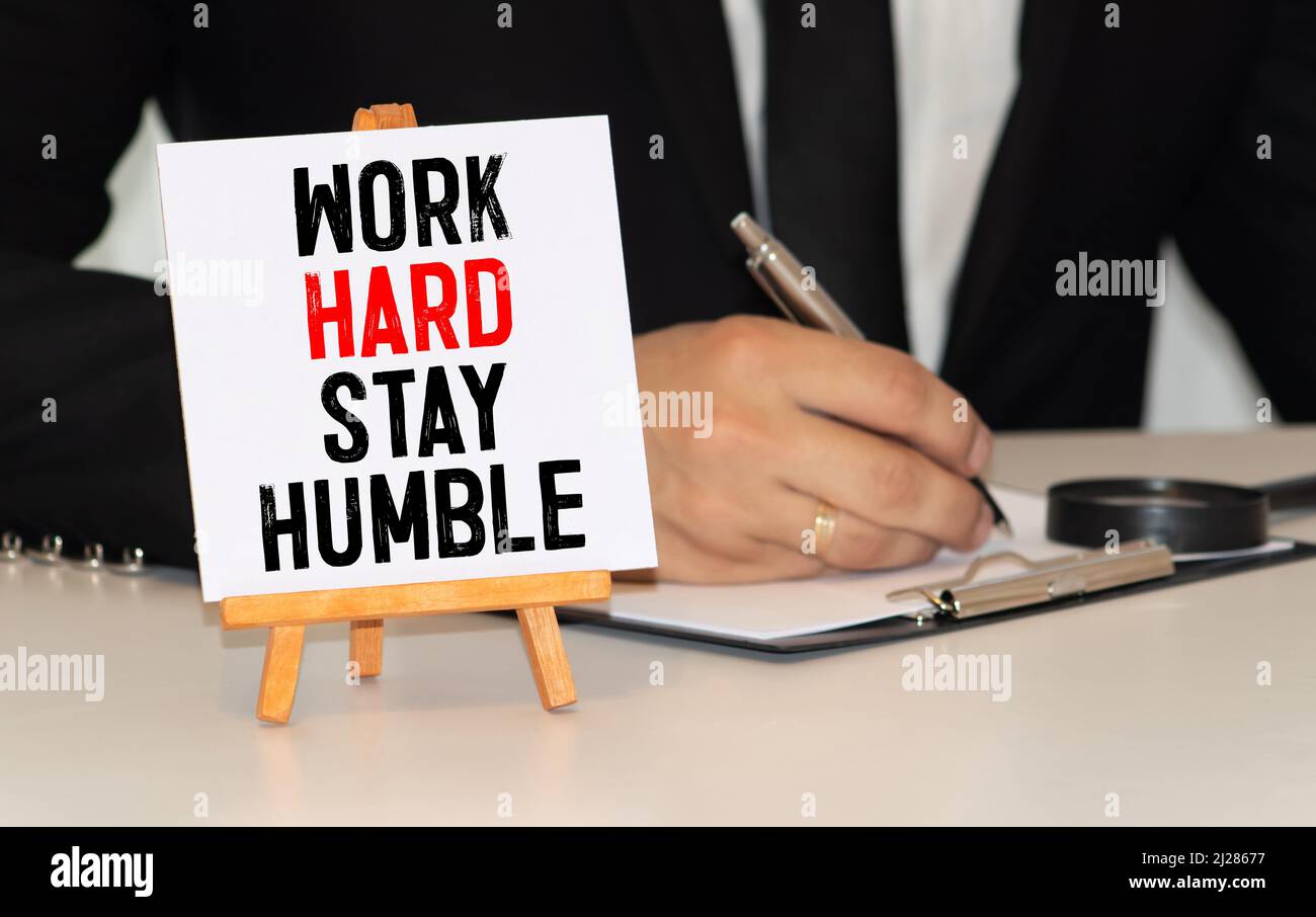 Word quotes of WORK HARD STAY HUMBLE on colorful memo papers with ...