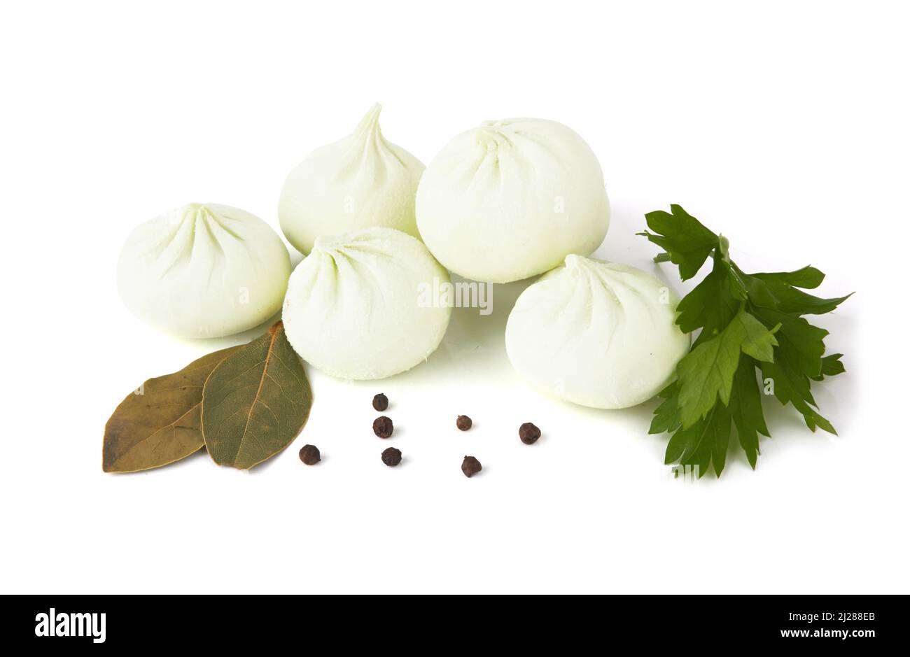 Frozen green khinkali isolated on white background Stock Photo - Alamy