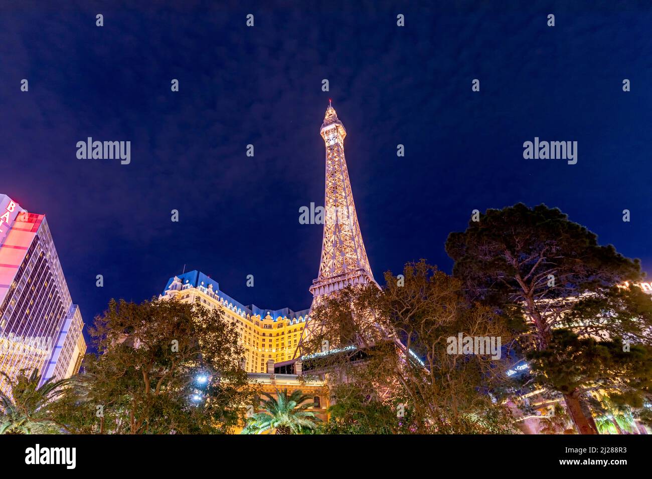 Las Vegas, USA - March 10, 2019: the replica of the eiffel tower at the Strip is illuminated by ...