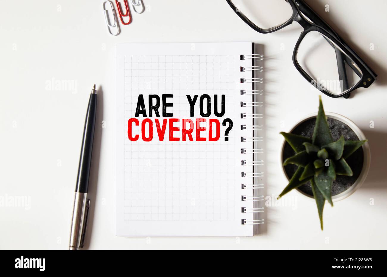 Are you covered text on white paper Stock Photo - Alamy
