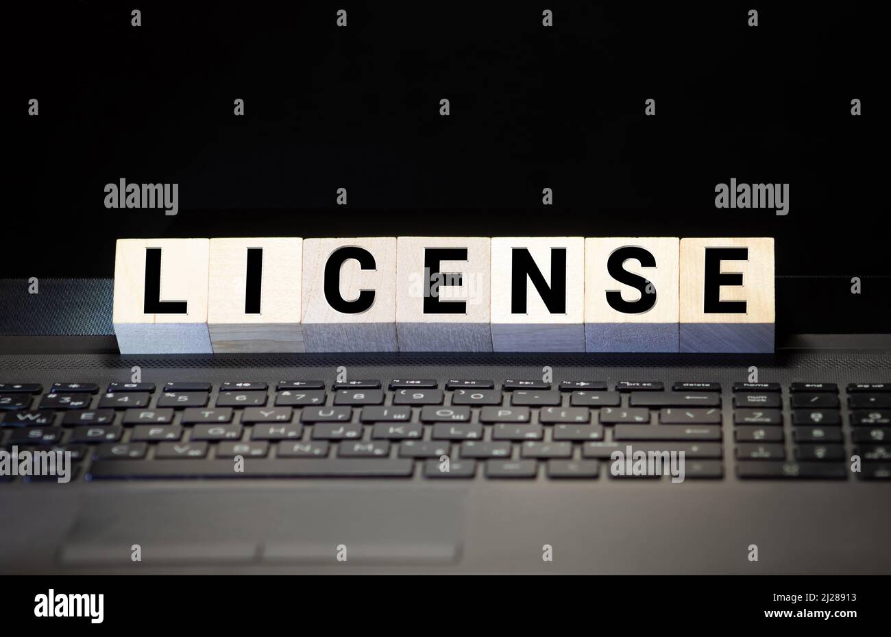 LICENSE word on block concept, business concept Stock Photo - Alamy