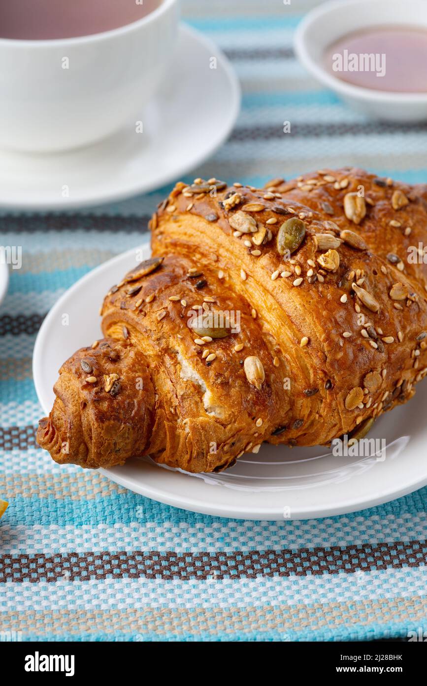 Fresh croissant with seeds ready for breakfast Stock Photo - Alamy