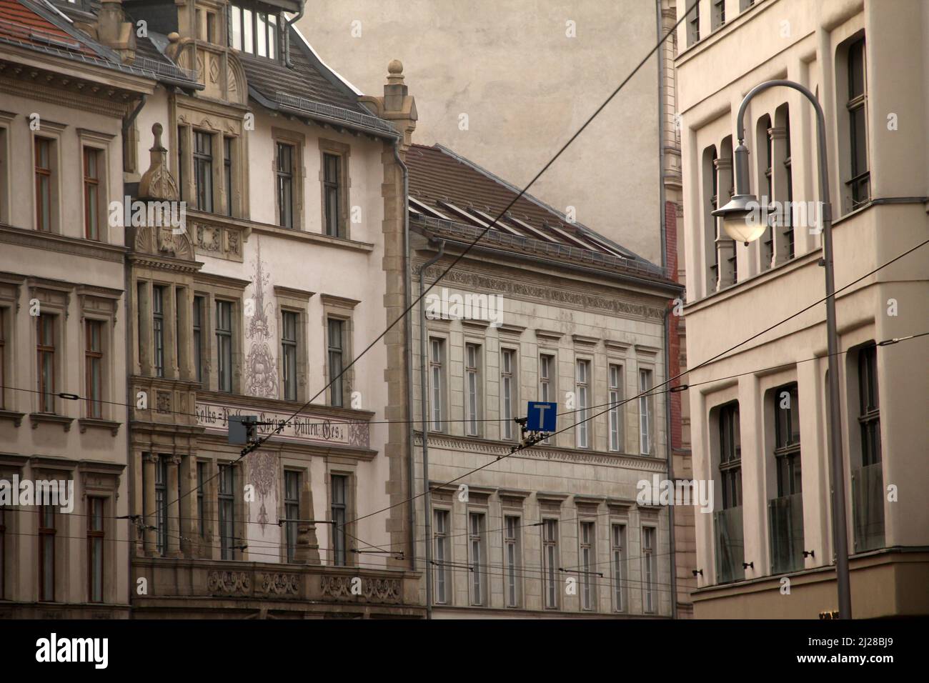 A beautiful shot of vintage stone buildings in an alley in Paris ...