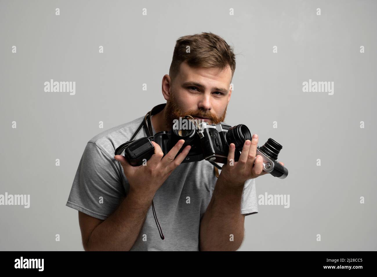 Vintage paparazzi cameras hi-res stock photography and images - Alamy