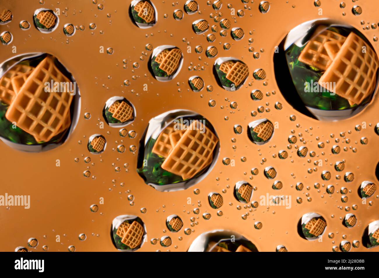 Creative macro food still-life of breakfast waffles reflected in water ...