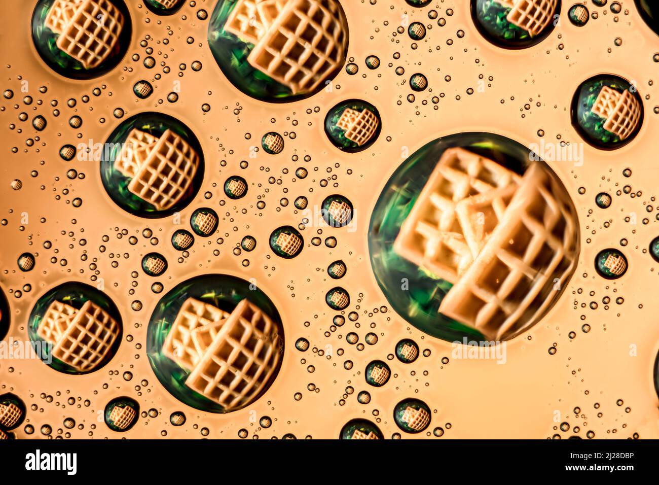 Creative macro food still-life of breakfast waffles reflected in water ...