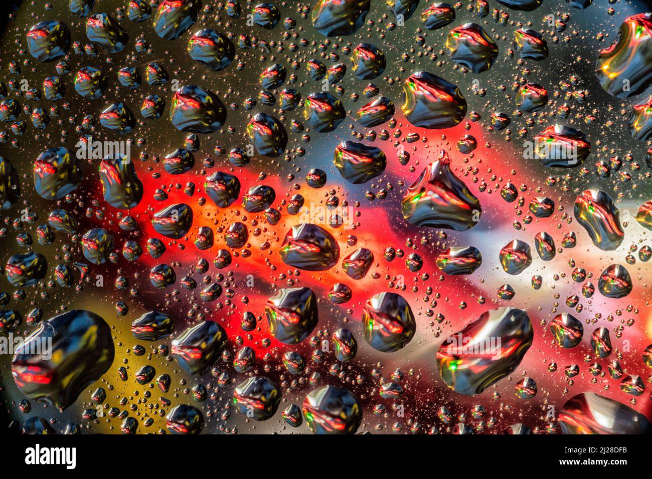 Abstract irregular water drops macro showing reflected colours Stock ...