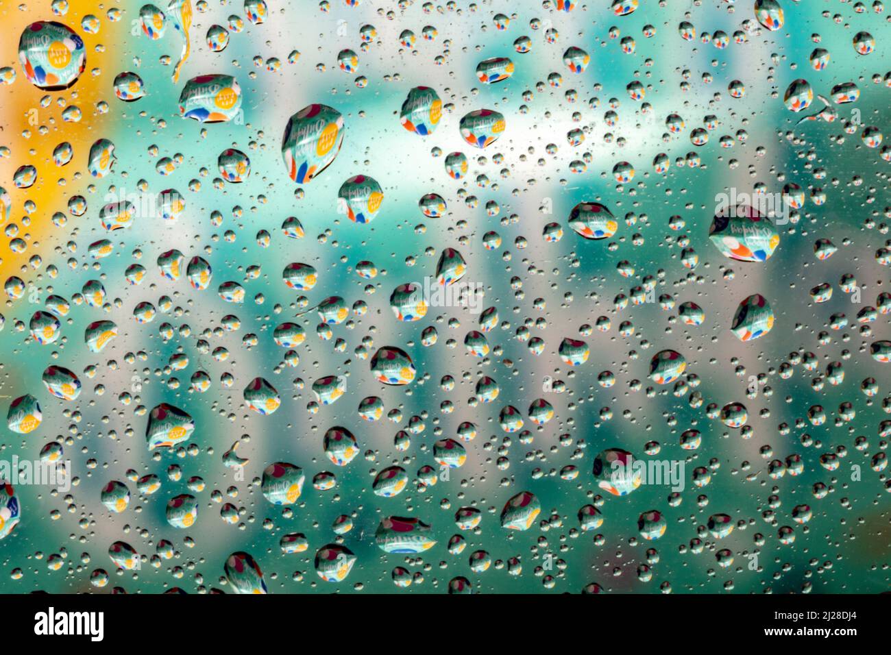 Abstract irregular water drops macro showing reflected colours Stock ...