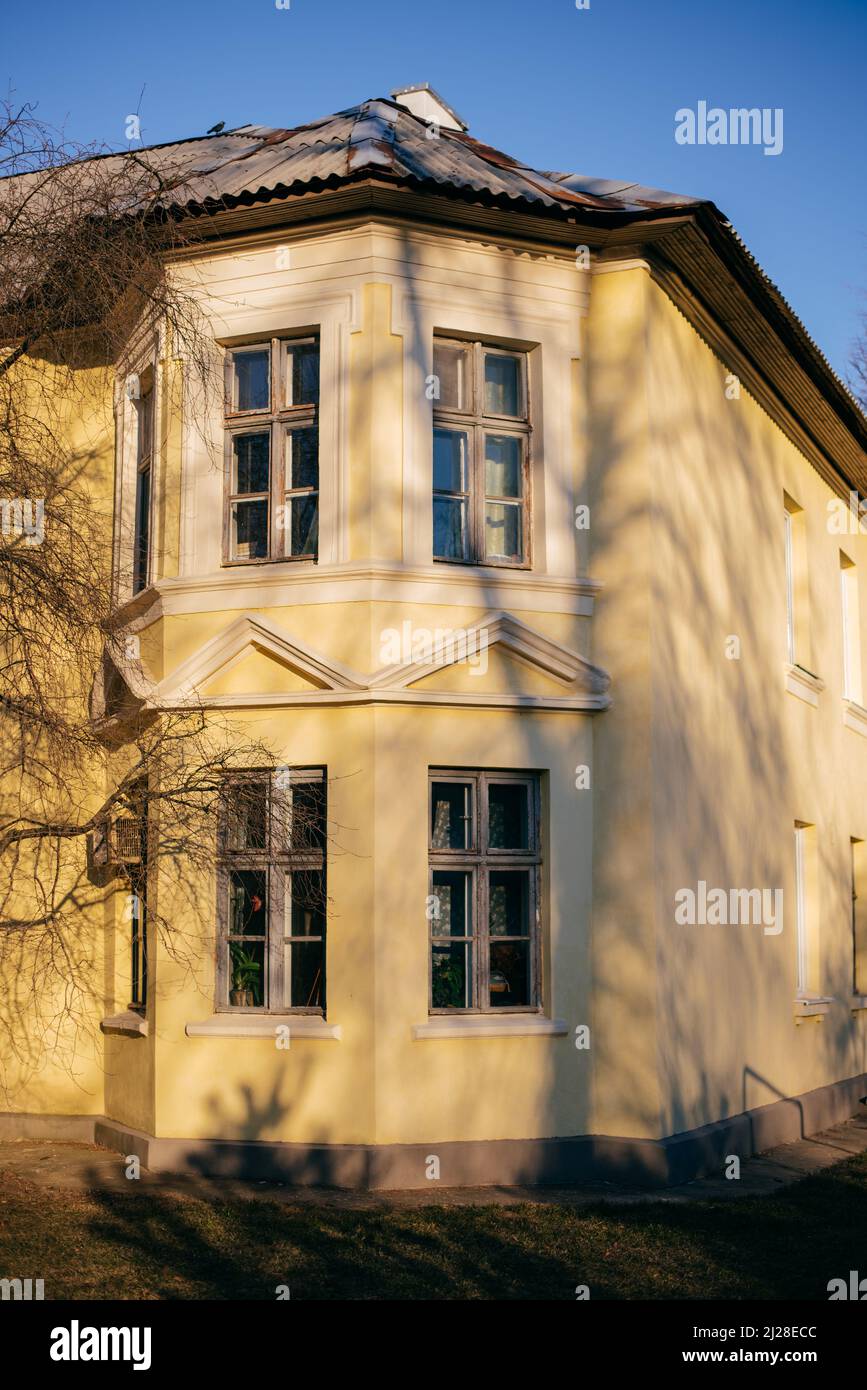 old yellow two-storey house in sunny weather Stock Photo - Alamy