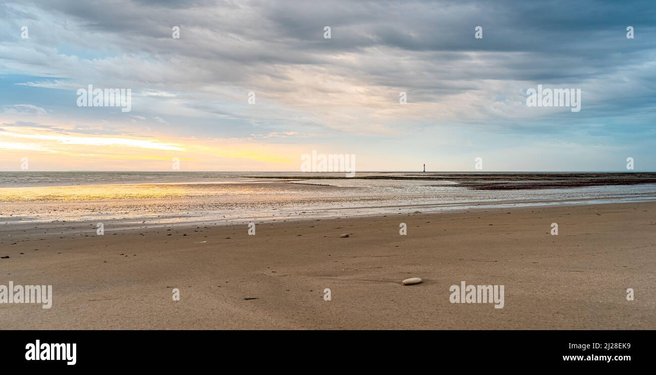 Chauveau Lighthouse standing in atlantic ocean during low tide ...