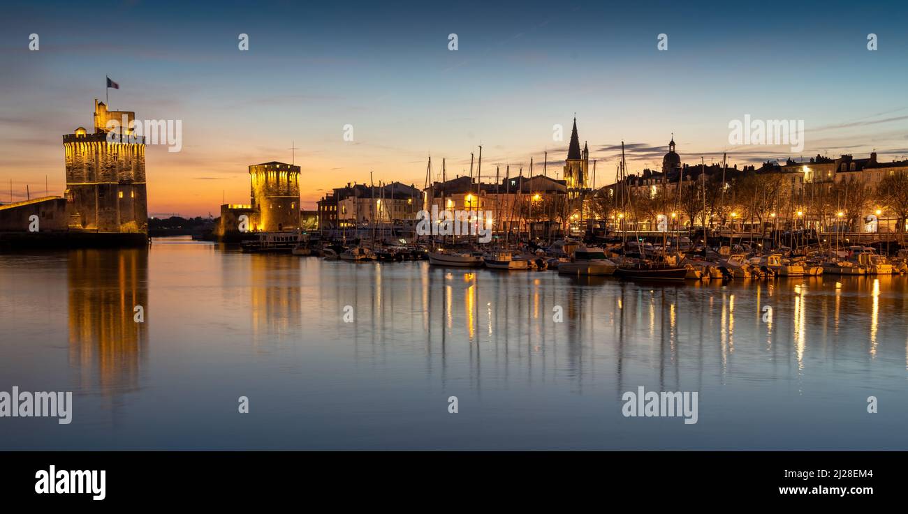 Panoramic view of the old harbor of La Rochelle at sunset. beautiful ...