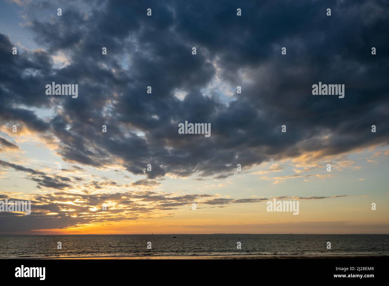 atlantic ocean with smooth wave and sunset sky abstract background ...