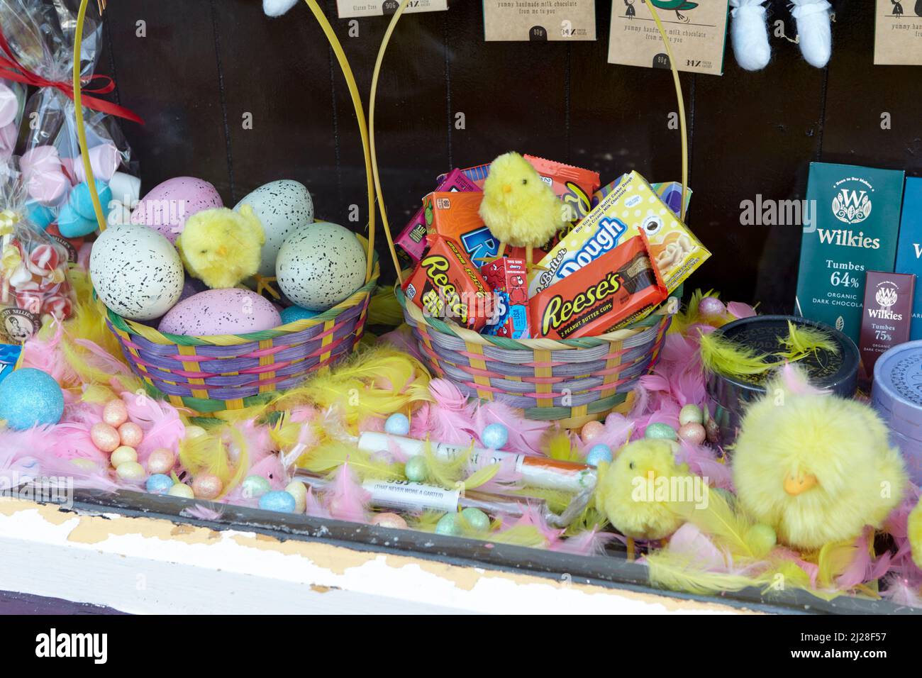 easter eggs and easter display in the window of a candy store sweet ...