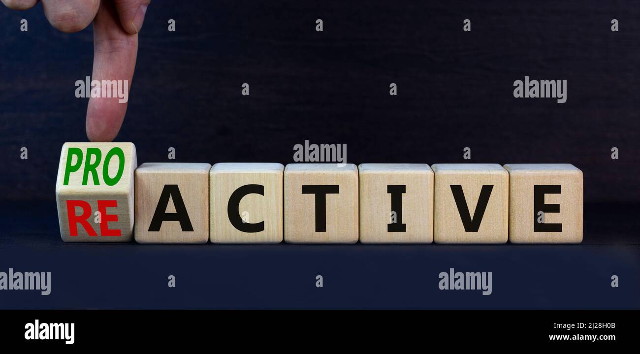 Reactive or proactive symbol. Turned wooden cubes and changed the ... Reactive or proactive symbol. Turned wooden cubes and changed the ...