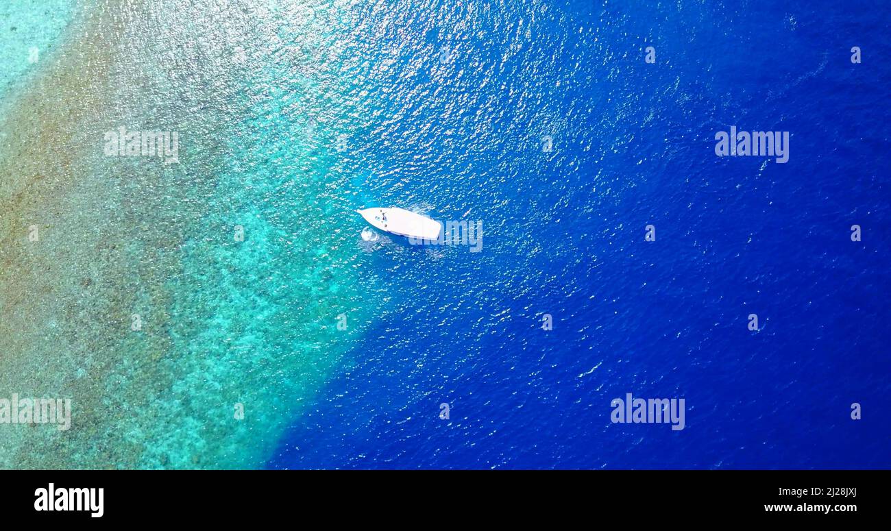 A top view shot of the Indian Ocean under the cloudy skies in the ...