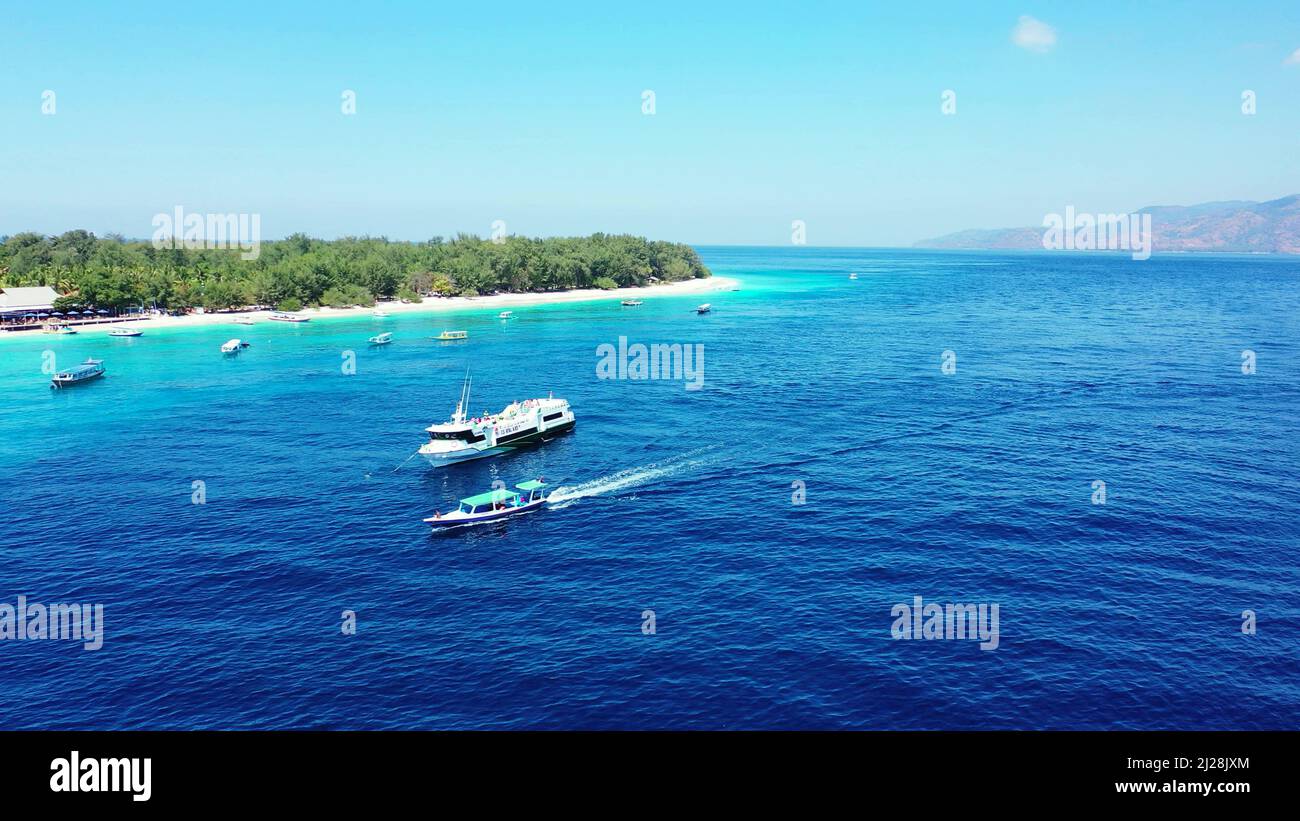 A beautiful shot of some boats in the Indian Ocean under the cloudy ...