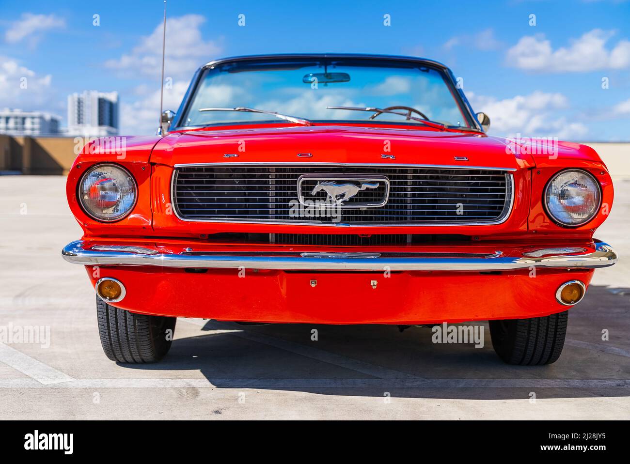 A front view of red 1966 convertible Ford Mustang with convertible ...