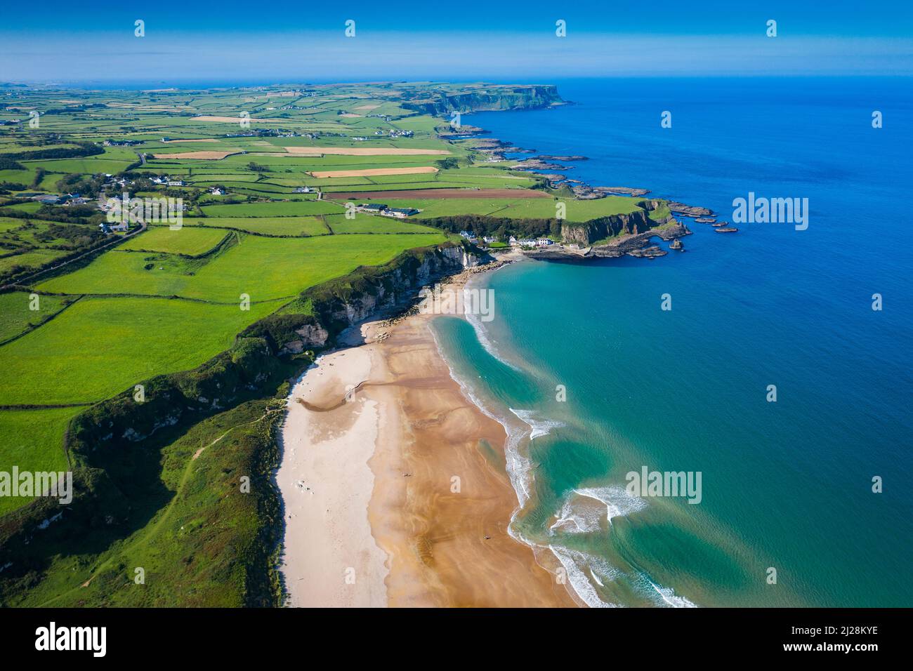 Aerial photograph of White Park Bay and the Hamlet of Portbradden and ...
