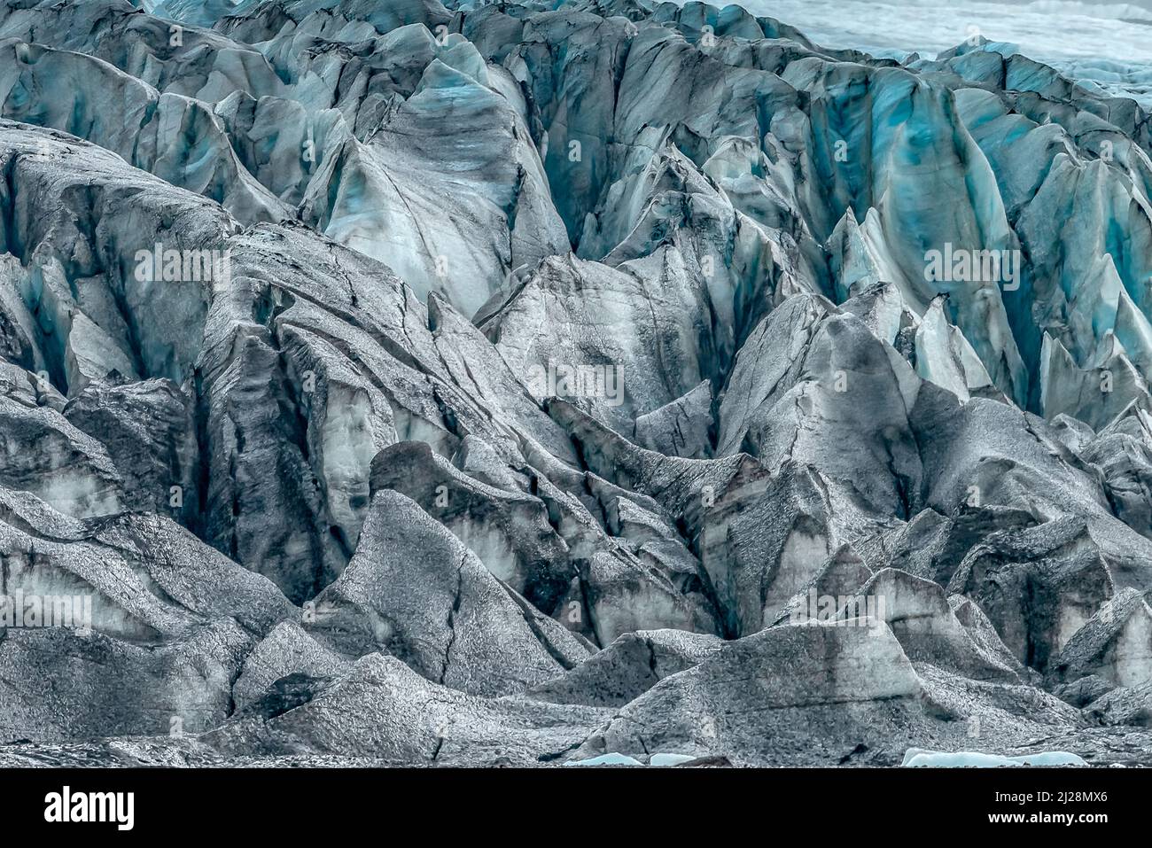 Close-up view of massive blue ice layers of Skaftafell Glacier ...