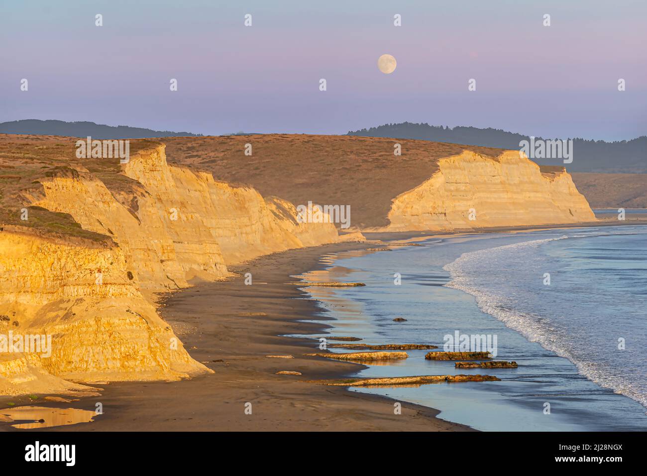 Full Moon rising behind the cliffs at Drakes Beach in Point Reyes ...