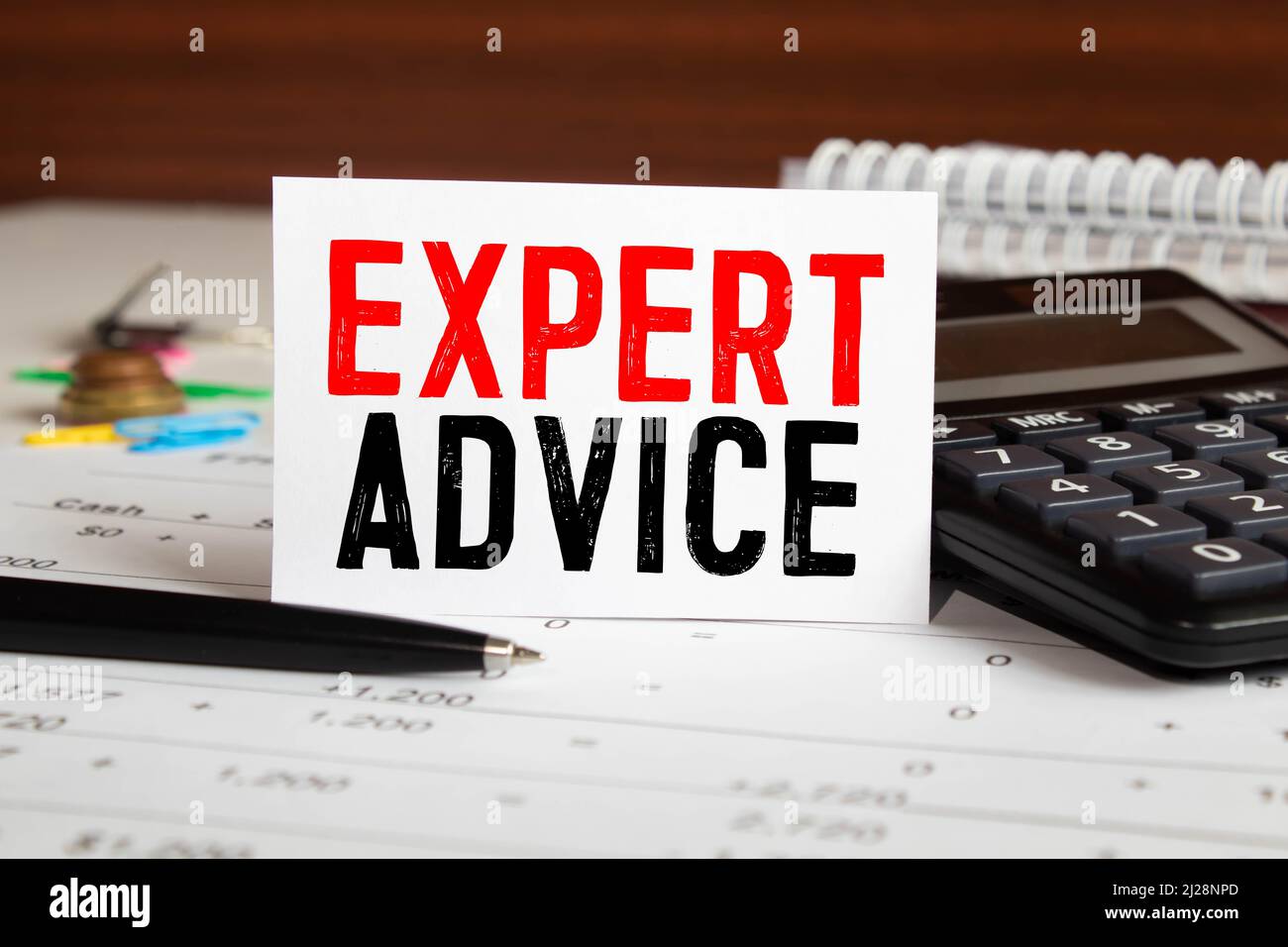 Expert advice text is signed by marker on white paper Stock Photo - Alamy