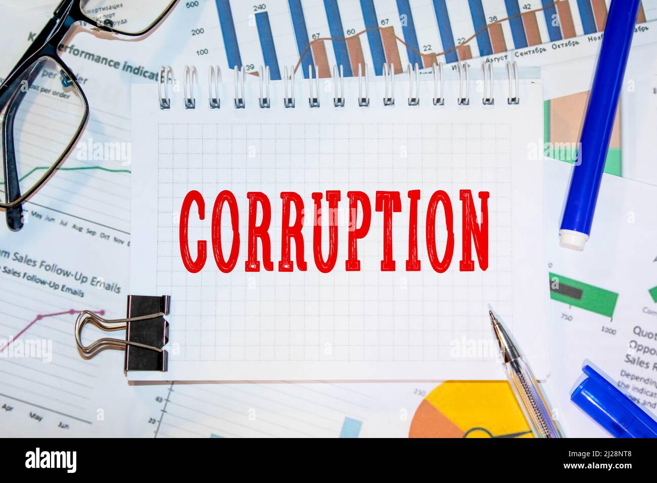 Torn pieces of paper with the word Corruption. Concept Image. Black and ...