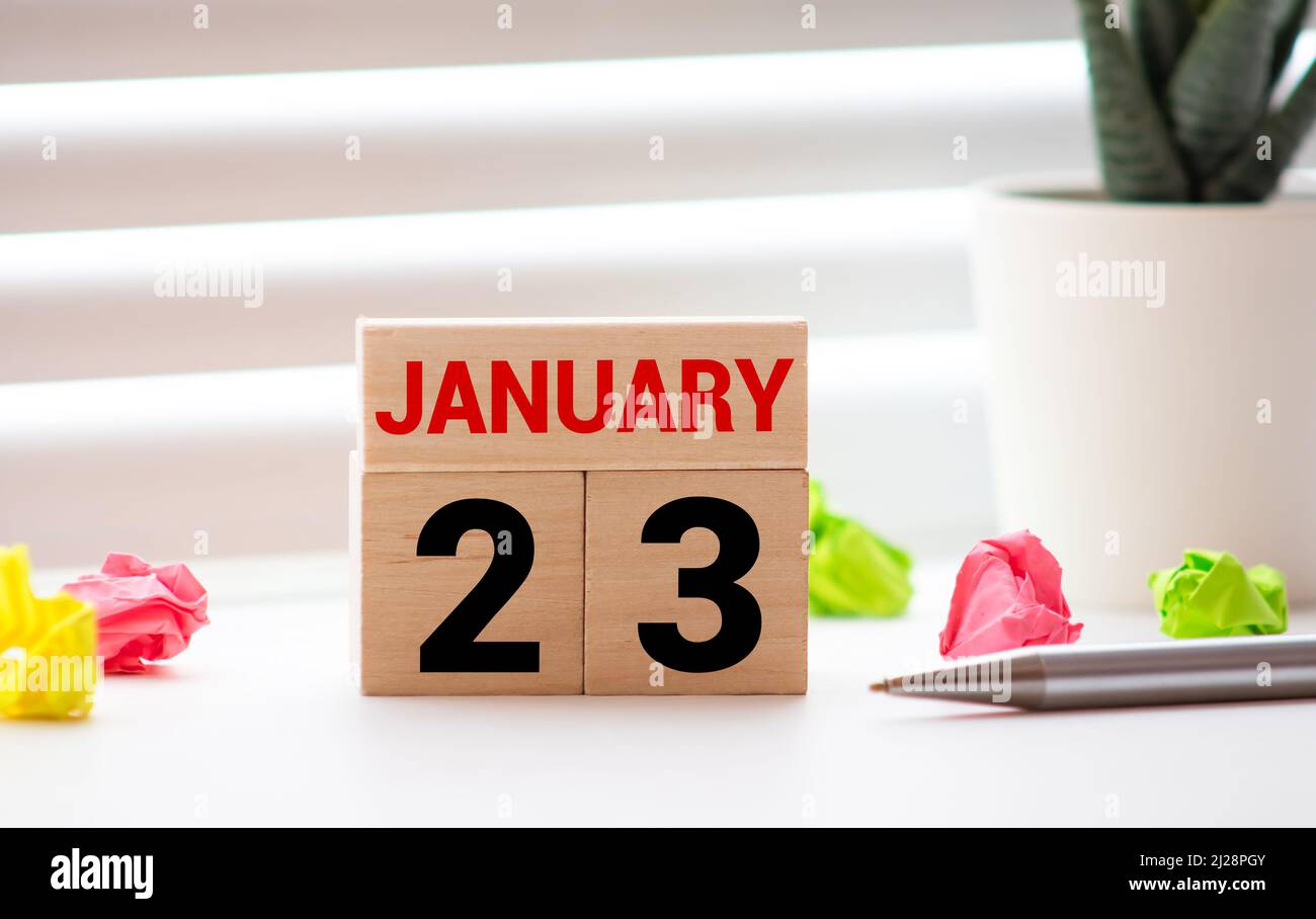 Wooden cubes calendar with the date of January 23. Concept calendar for ...