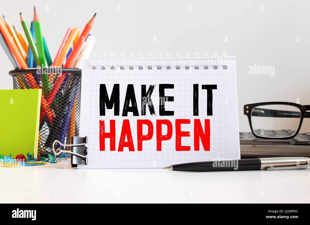 the phrase make things happen written on sticky note over corkboard ...