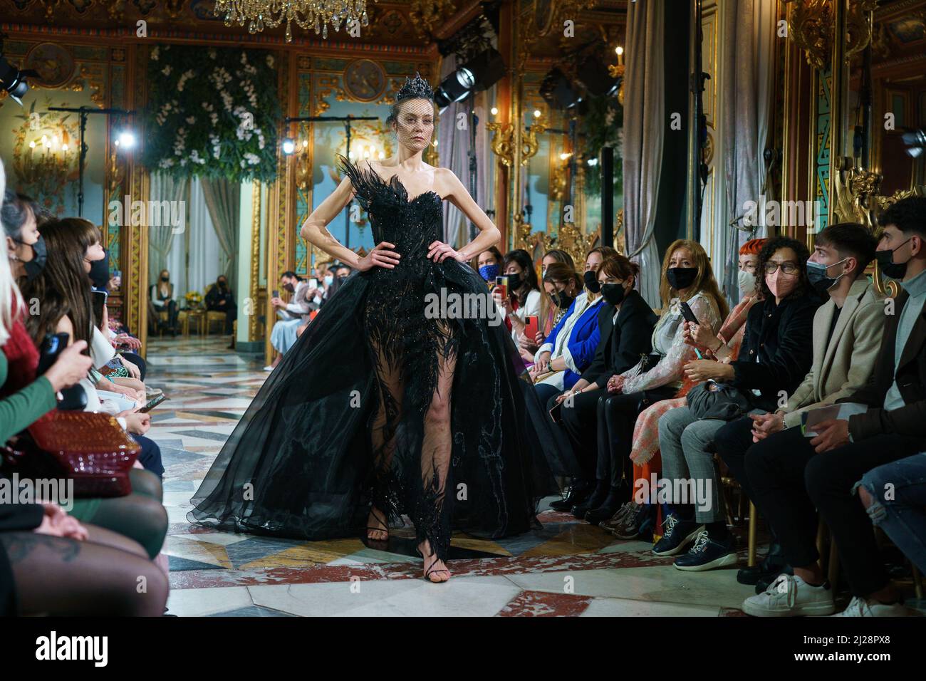 Madrid, Spain. 30th Mar, 2022. A model showcases Diazar design during ...