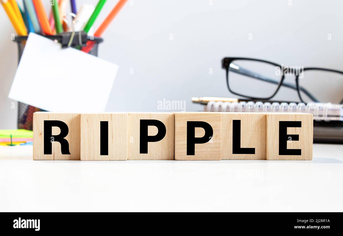 Word RIPPLE formed by alphabet blocks on mother cryptocurrency Stock ...