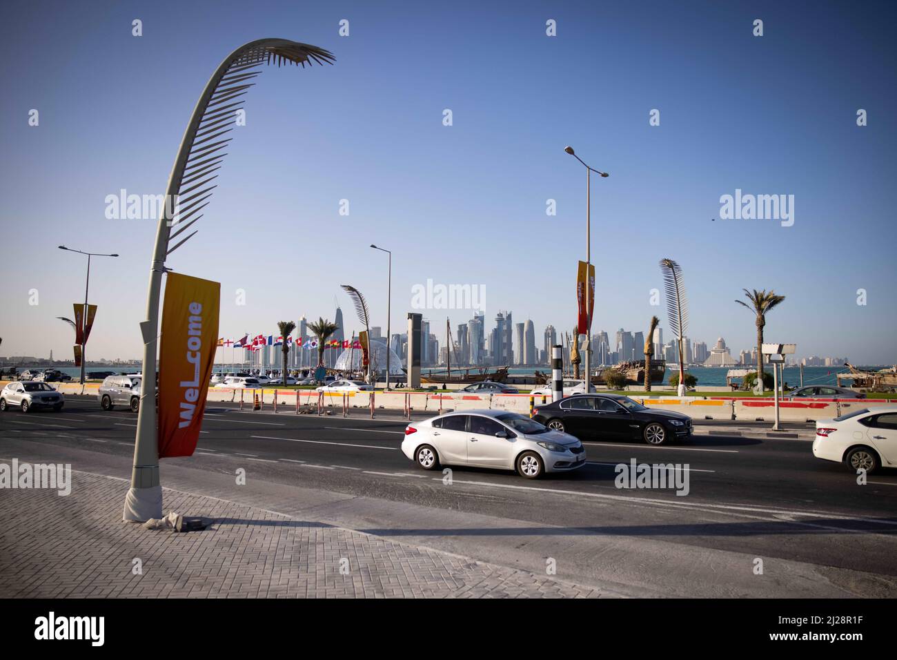 Doha, Qatar. 30th Mar, 2022. Evening traffic on the Corniche promenade ...