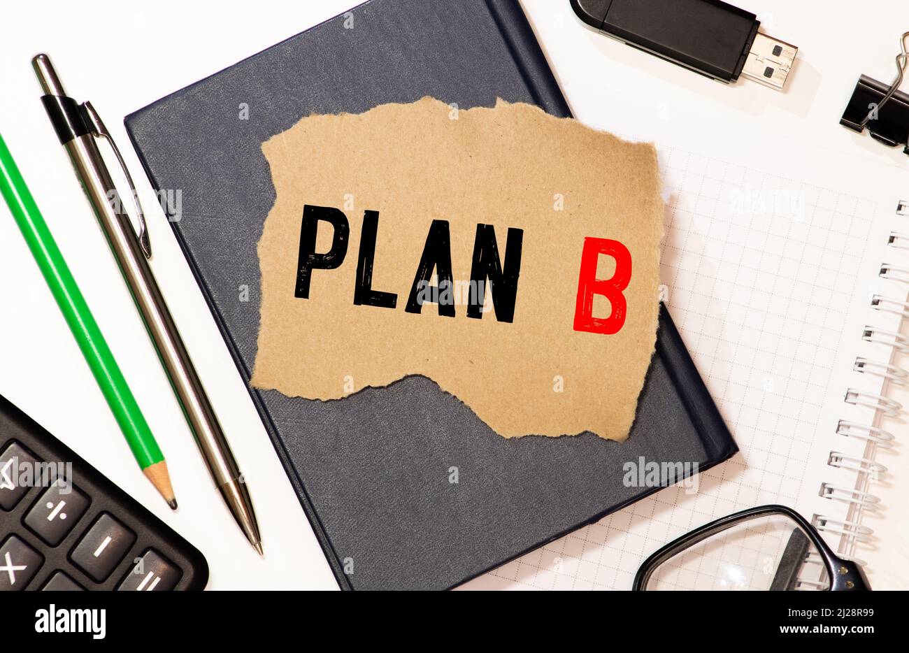 Plan B torn paper. Brown package paper torn to reveal the text Plan B ...