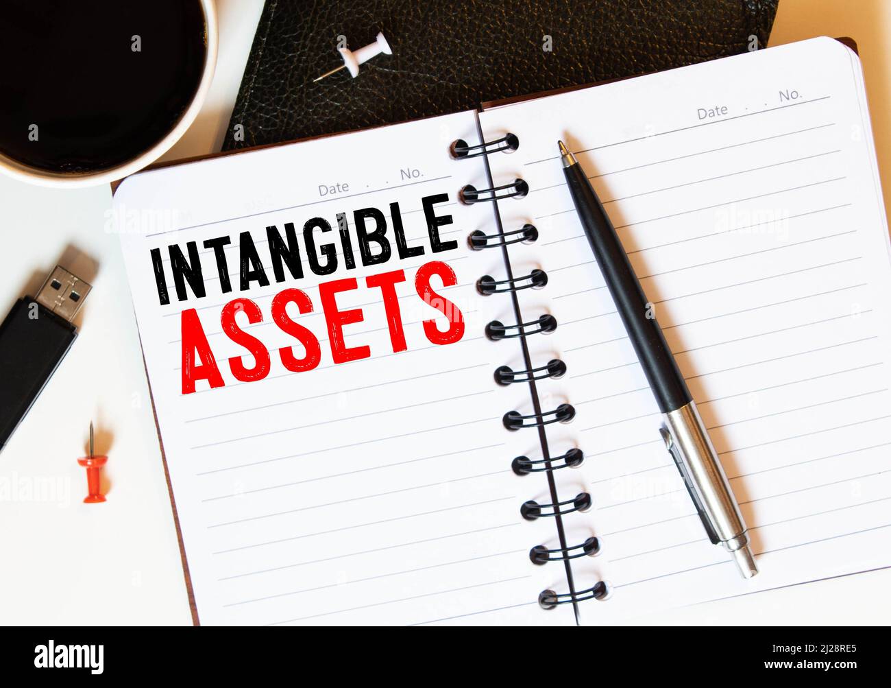 Intangible Asset text written on a notebook with pencils Stock Photo ...