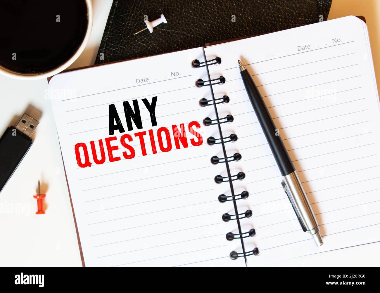 Red text Any Questions and paper question mark with white background ...