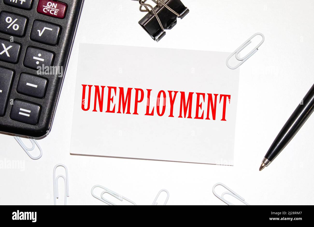 Words unemployment written on torn paper on a computer keyboard Stock ...