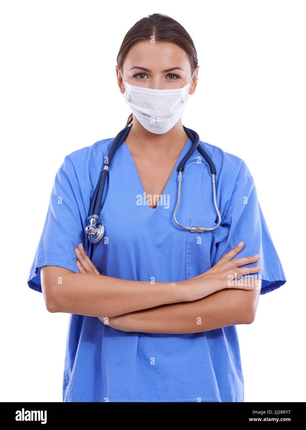 Ready for your surgery. A young surgeon wearing scrubs and a surgical ...