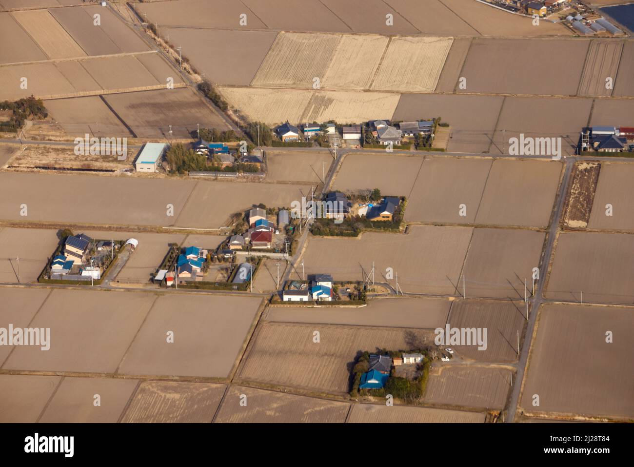Aerial view of housing plots surrounded by dry farmland Stock Photo - Alamy