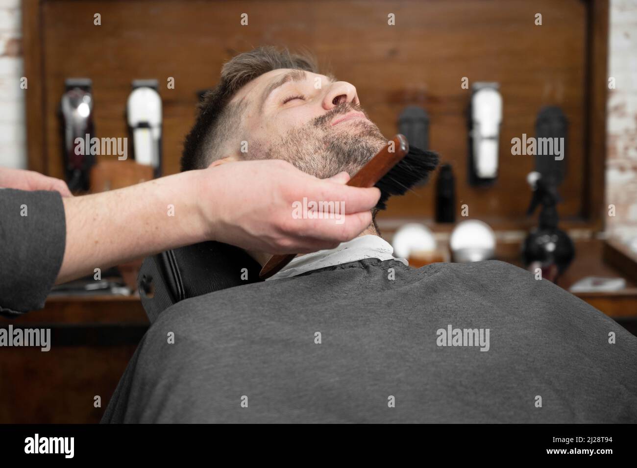 Shot barber using brush on hi-res stock photography and images - Alamy