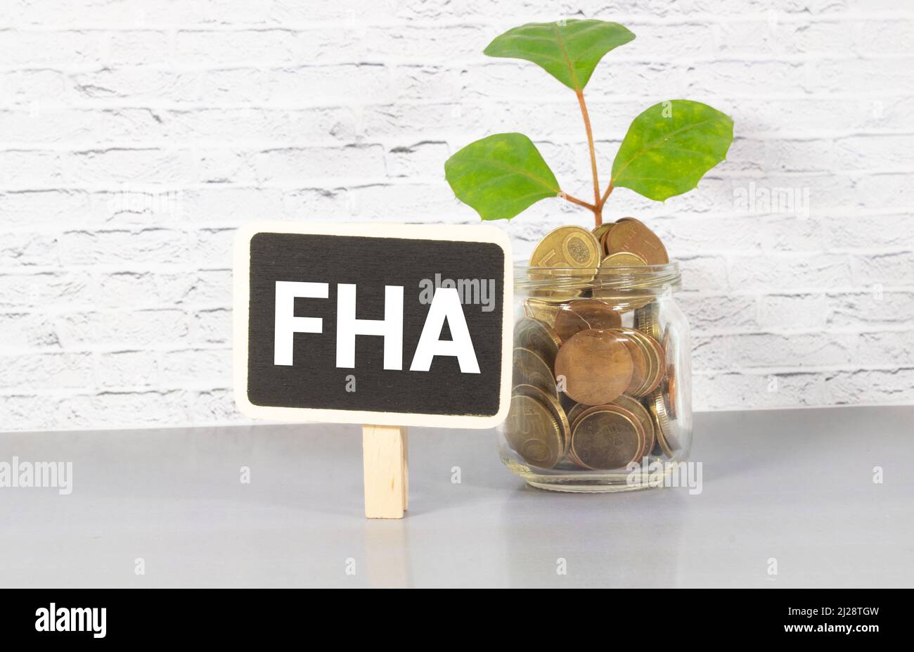 FHA symbol. Wooden cubes form the word 'FHA, federal housing ...